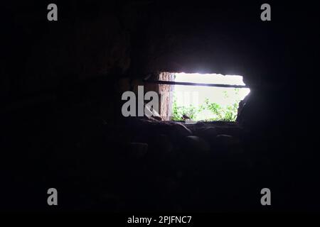 Opening in a wall with grating Stock Photo - Alamy
