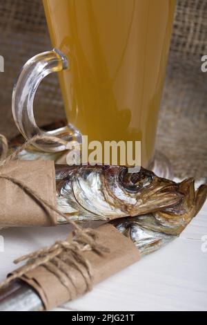Putassu Cold smoked. The fish is wrapped with a strip of paper. Tied ...