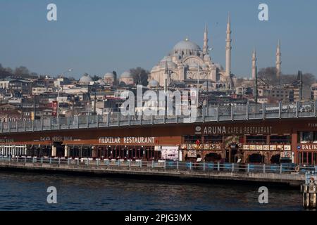 ISTANBUL, TURKEY - APRIL 1, 2022 : People fishing at Galata Bridge in ...