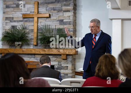 Pastor George Grant delivers the sermon during a Palm Sunday service at ...