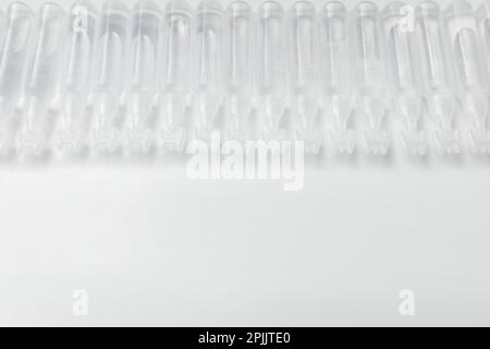 Single dose ampoules of sterile isotonic sea water solution on white ...
