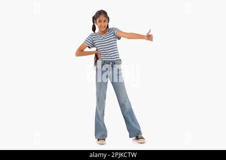 Tween With Thumbs Up Stock Photo - Alamy