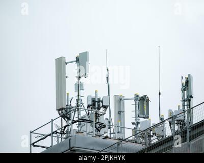 A 4G LTE antenna atop a built structure, connecting people and industry ...