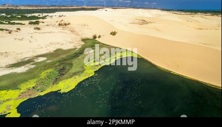 Stark geographical contrast between sand and water near Mui Ne, Vietnam ...