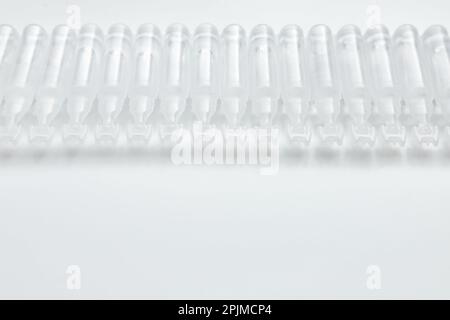 Single dose ampoules of sterile isotonic sea water solution on white ...