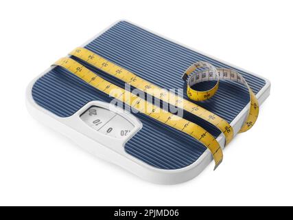 Scales and measuring tape isolated on white, top view Stock Photo - Alamy
