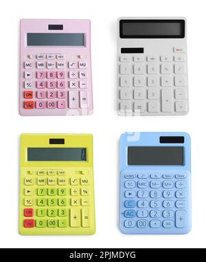 Set of different calculators on white background Stock Photo - Alamy