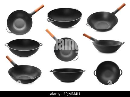 Set with empty woks on white background Stock Photo - Alamy