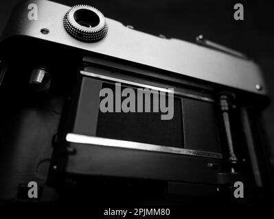 A grayscale shot of the small parts of an old vintage camera Stock ...