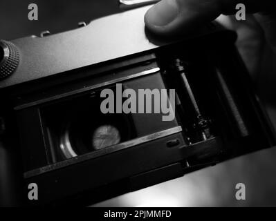 A grayscale shot of the small parts of an old vintage camera Stock ...
