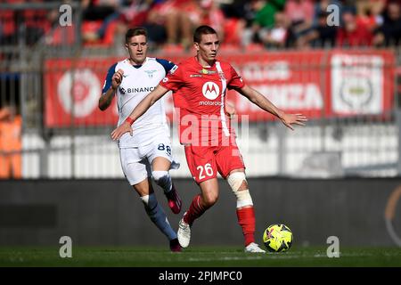 Toma Basic of SS Lazio competes for the ball with Dusan Vlahovic of ...