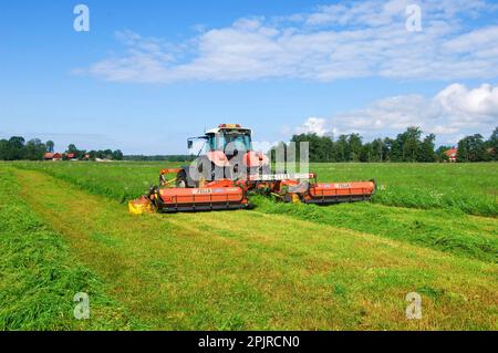 Mowing grass silage with Steyr tractor and Fella front and rear mower ...