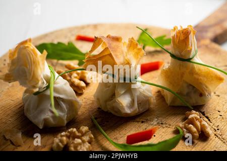 Oven-baked filo pastry vegetable packets Stock Photo - Alamy