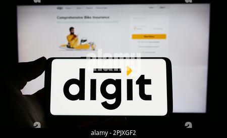 Cellphone with logo of company Go Digit General Insurance Limited on ...