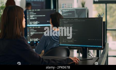 Database programer writing source code and script on terminal window ...