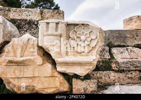 Ancient sculpted marble ruins at the Archaeological Site of Eleusis in ...