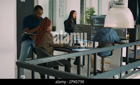 Database programer writing source code and script on terminal window ...
