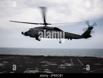 230404-N-MH015-1030 EAST CHINA SEA (April 4, 2023) An MH-60R Sea Hawk ...