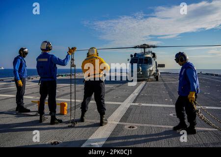 NATUNA SEA (Mar. 26, 2023) An MH-60R SeaHawk, attached to Helicopter ...