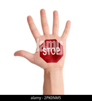 Woman showing palm with drawn STOP sign on white background, closeup ...