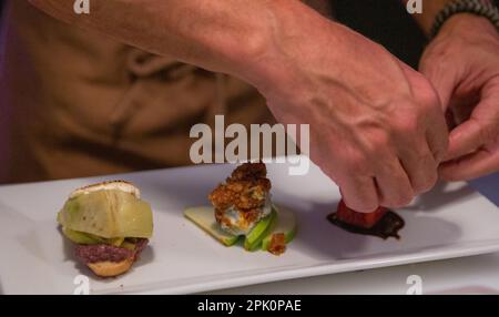French chef preparing a variety of appetizer Stock Photo - Alamy