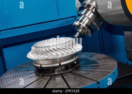 Making turbine wheel with robotized lathe machine at plant Stock Photo ...