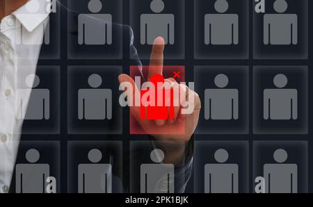 Deciding whether to dismiss employee. Man with marker near virtual ...