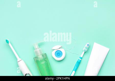 Set for oral hygiene on turquoise background Stock Photo - Alamy