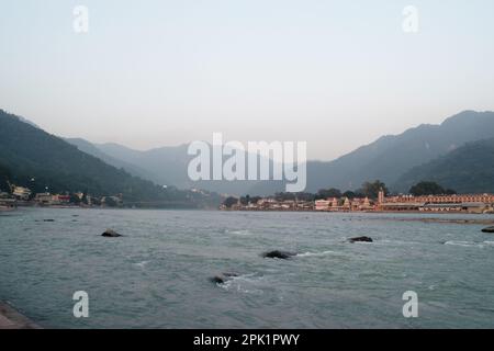 Winter view of ganga riverside at rishikesh Stock Photo - Alamy