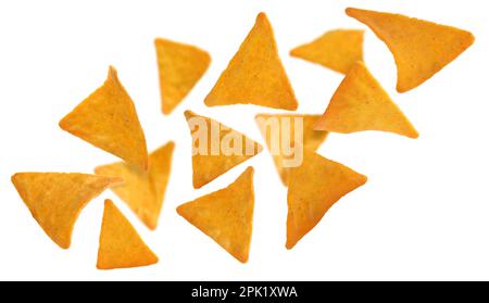 Tasty tortilla chips (nachos) falling on white background Stock Photo ...