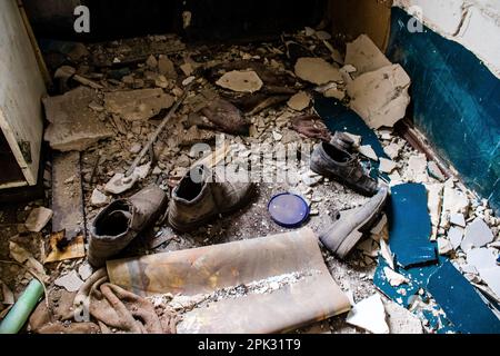 Interior of a house destroyed by a Russian bombardment. Objects of ...