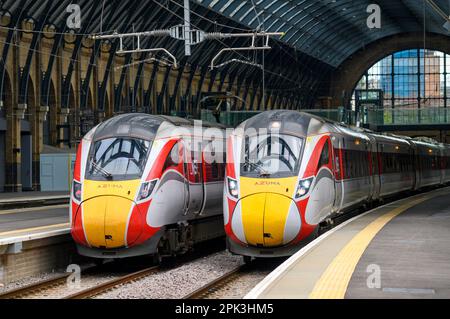 Pair of Azuma high speed trains in LNER livery waiting at Kings Cross railway station, London ...