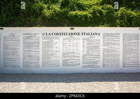 Italian Constitution printed on a white wall in the town of Aielli ...