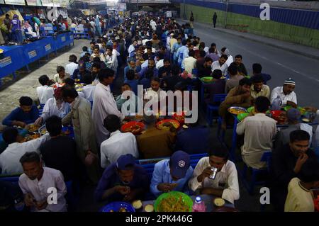 Karachi, Pakistan, April 5, 2023. Faithful Muslims are breaking the ...