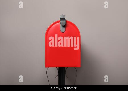 Closed red letter box against brown background. Space for text Stock ...