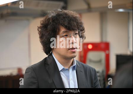 Co-founder of Kuma Academy Puma Shen delivers a speech during a media ...