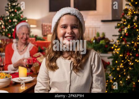 Theme family holiday New Year and Christmas. Young caucasian family mom ...