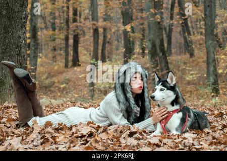 Unconditional love. Siberian husky favorite pet. Animal husbandry. Girl ...