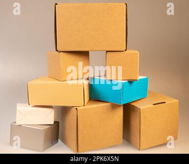 Little brown boxes in various formations on my light table Stock Photo ...