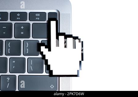Plastic pointer cursor touches a white screen smartphone isolated on a ...