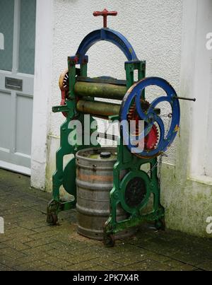 Vintage cast iron mangle or wringer with wooden rollers for wringing ...