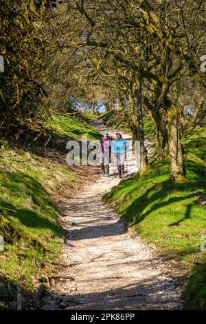 Two People Walking On The "Mam Tor" Mountain A Long Ridge Walk With ...