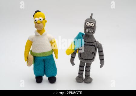 Homer Simpson felted toys and Bender work Stock Photo - Alamy
