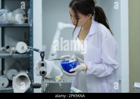 Prosthetic technician sculpting plaster cast for socket at factory Stock Photo - Alamy