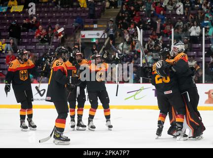 Germany goaltender Sandra Abstreiter (35) makes a save as USA forward ...