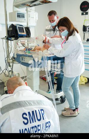 Newborn dummy emergency care training with breathing aid Stock Photo ...