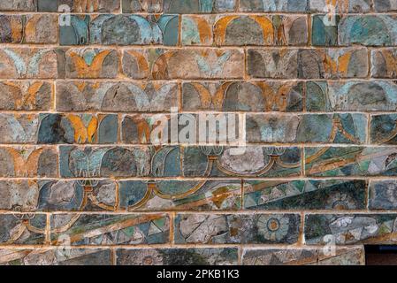 Colorful ancient Persian wall frieze in the Louvre museum in Paris ...