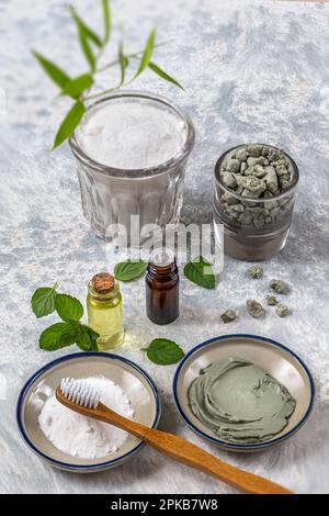 Homemade toothpaste made from baking soda, coconut oil, green clay and ...