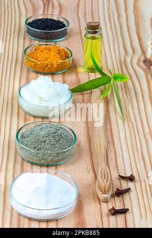 Homemade toothpaste made from charcoal, turmeric, coconut oil, clay ...