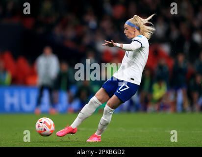 England's Chloe Kelly scores the winning penalty in the shoot-out ...